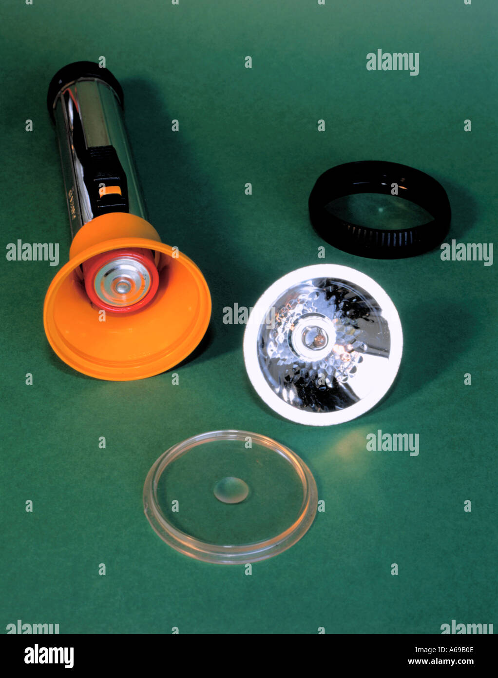 Disassembled battery powered hand torch Stock Photo - Alamy