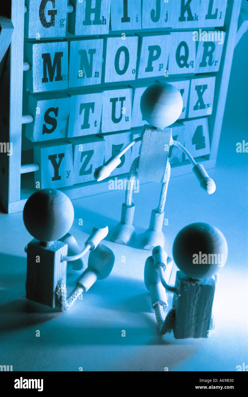 Wooden Figures and Alphabet Set Stock Photo - Alamy