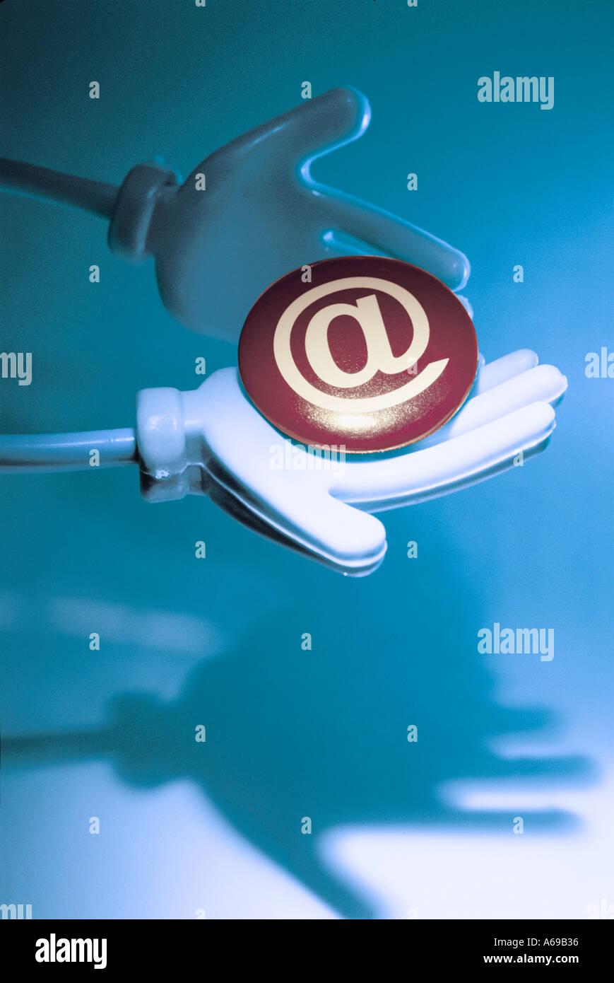 Toy Hands Holding Internet Symbol Stock Photo - Alamy