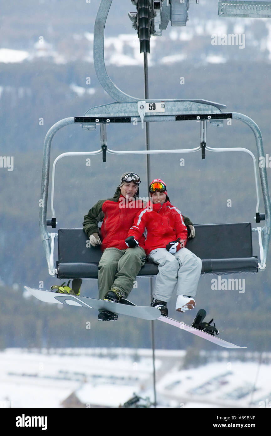 couple on chair lift Stock Photo - Alamy