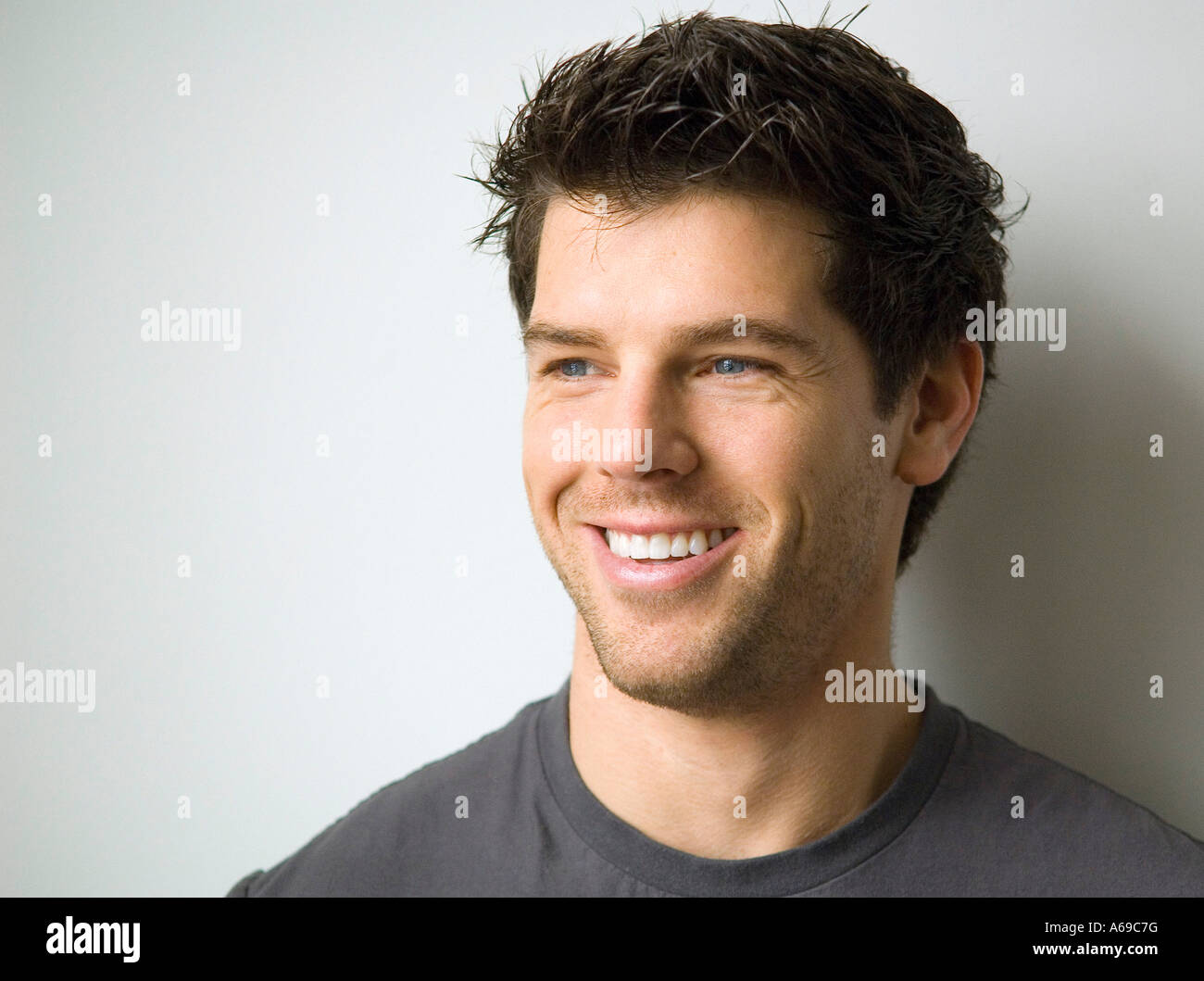 Face shot of a healthy young smiling man Stock Photo - Alamy