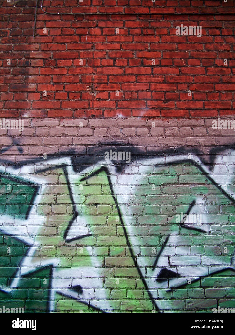 Graffiti on red brick wall Stock Photo - Alamy