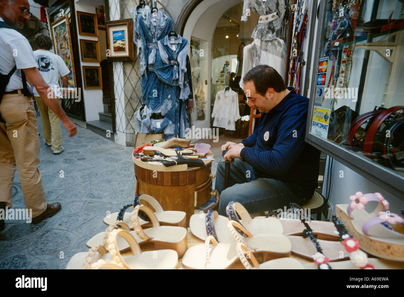 Positano Amalfi Coast Italy Shoemaker making sandals on the street ...
