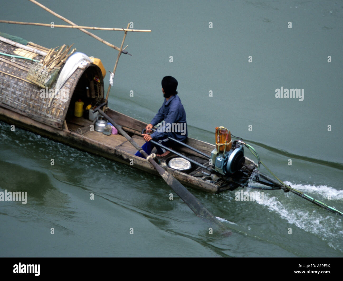 Small sampan on a river in Vietnam, seen from above Stock Photo - Alamy
