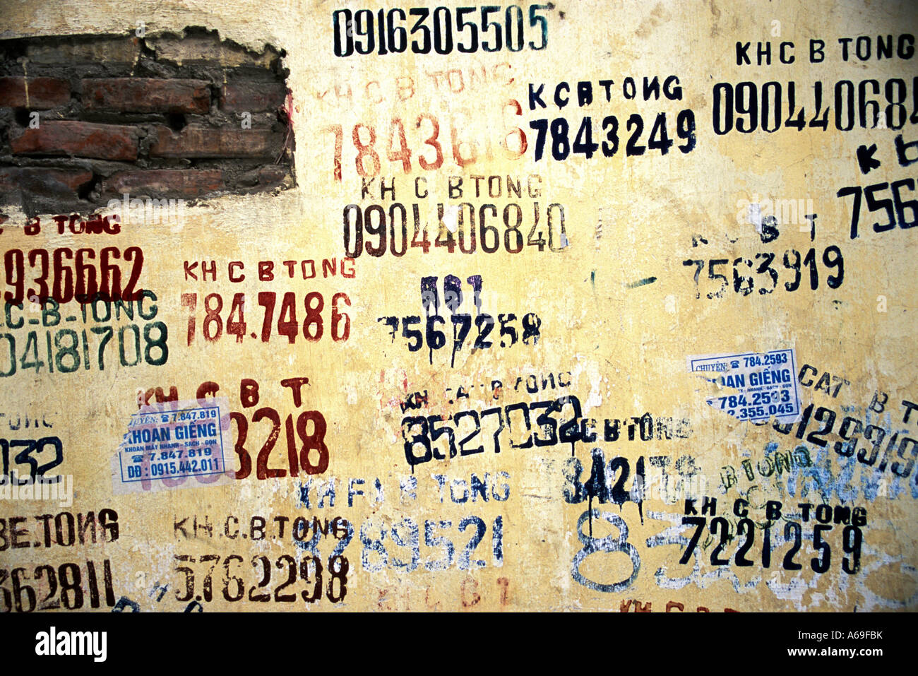 Stamps on the walls of houses in the Old Quarter of Hanoi, Vietnam ...