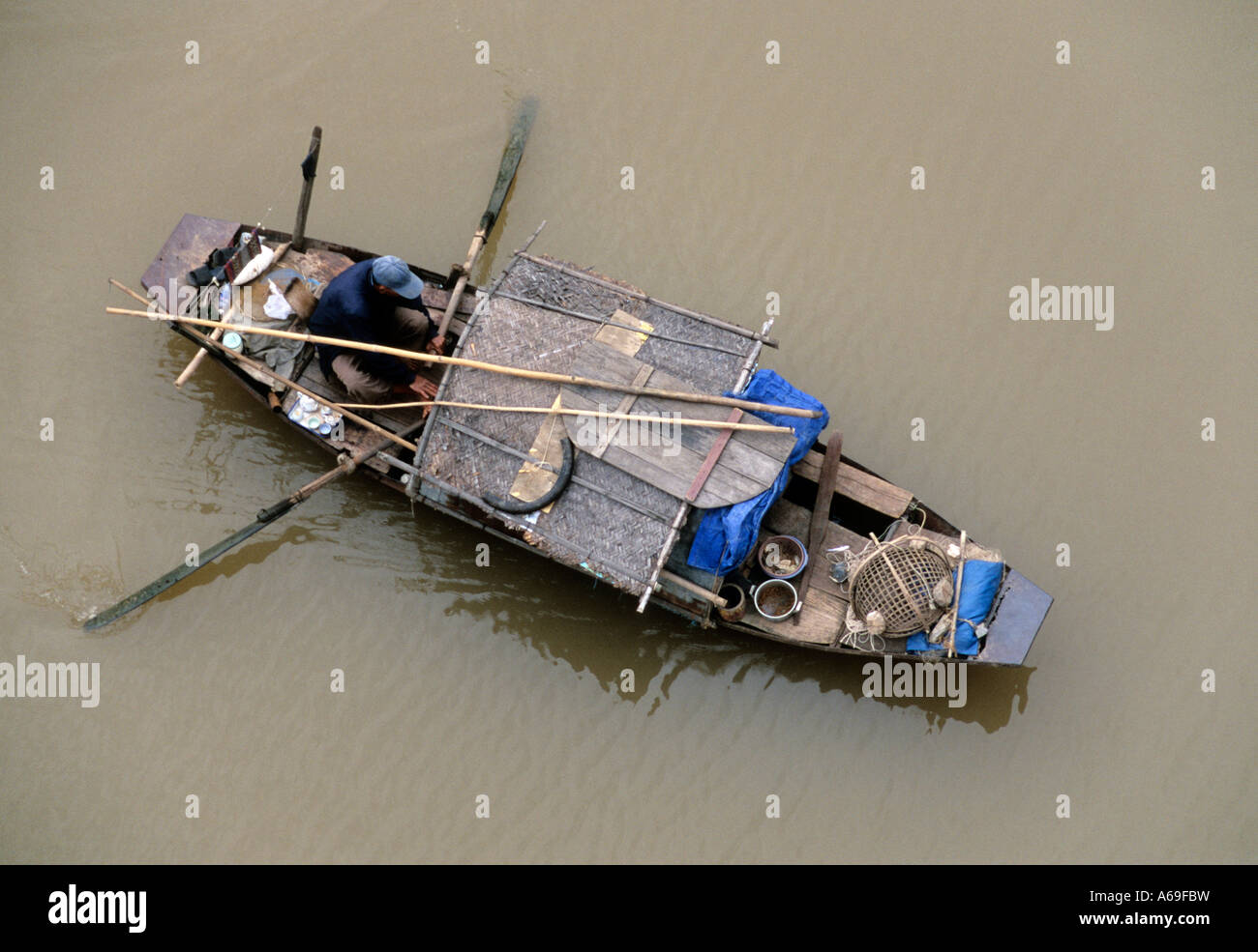 Bird's eye view on small sampan on the Red River, photographed from the ...