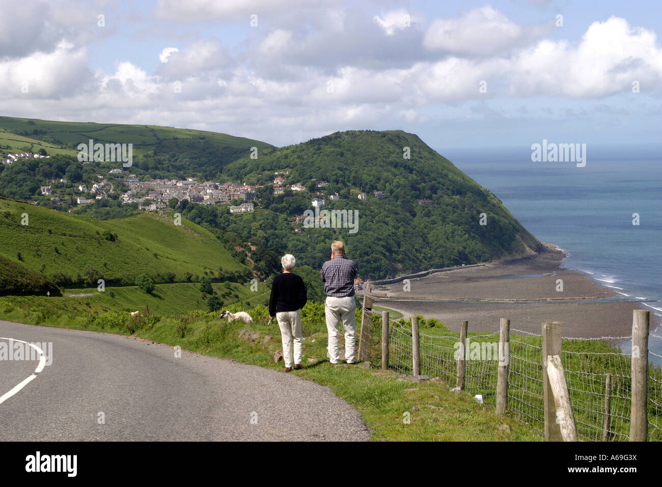UK Devon tourists admiring view over Lynton and Lynmouth from ...