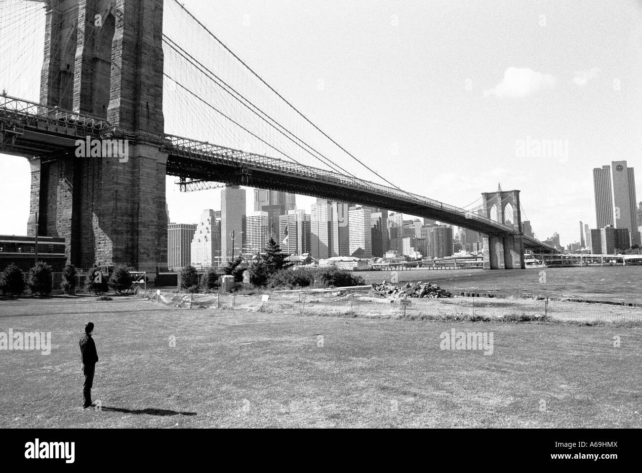 Man stood next to Brooklyn Bridge, New York City USA Stock Photo - Alamy