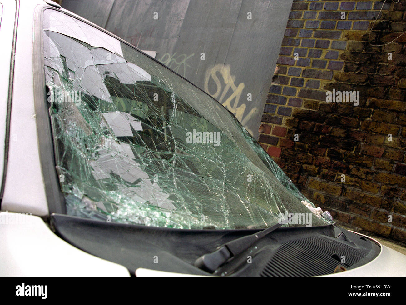 Vandalised car with smashed windscreen on London street Stock Photo - Alamy