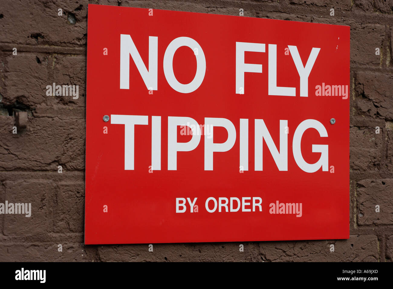 NO FLY TIPPING by order sign Stock Photo - Alamy