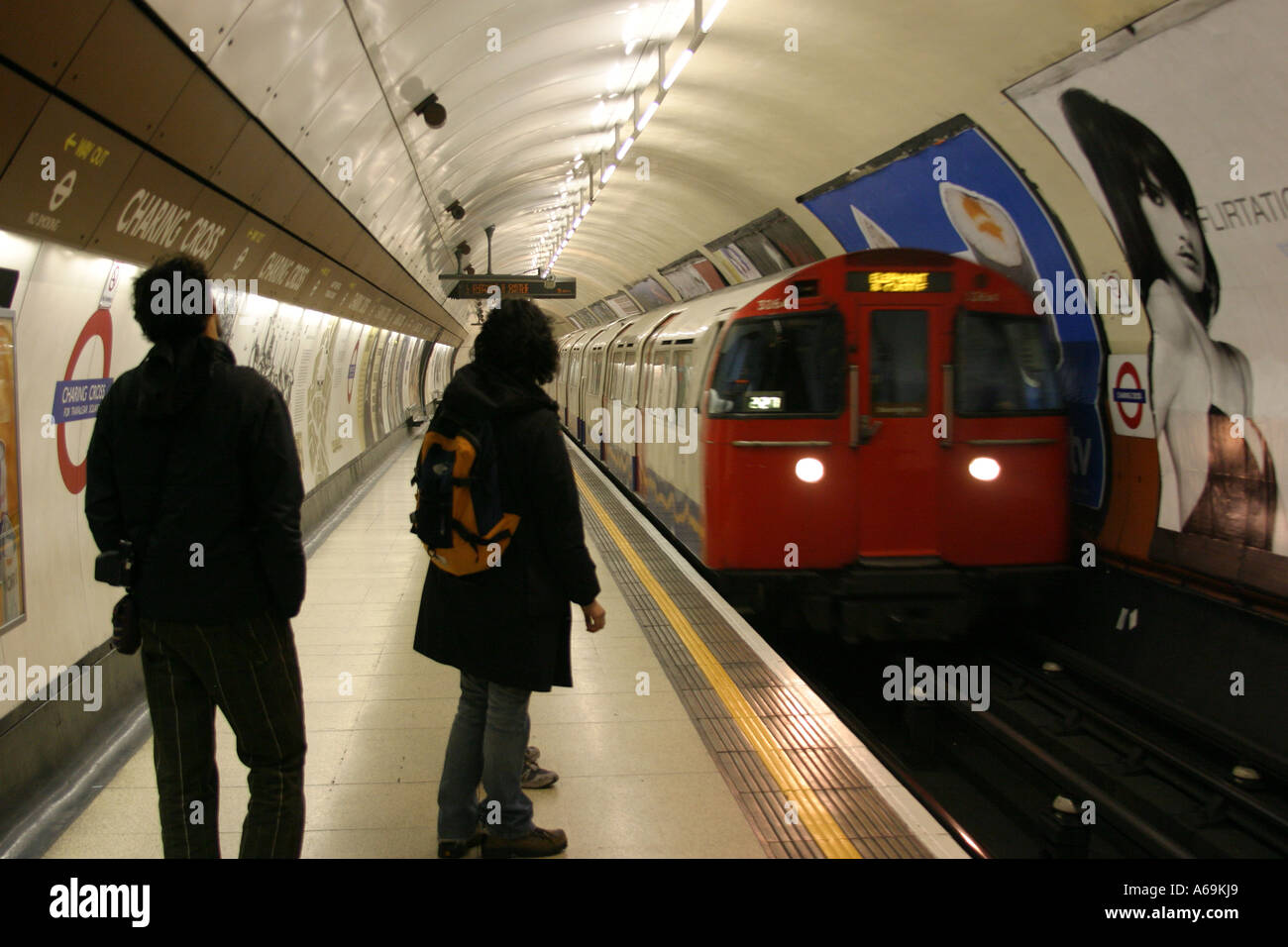 Train passing through station platform The Tube London UK Stock Photo ...