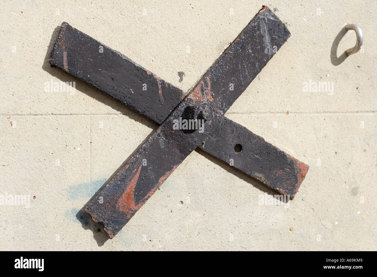 Metal letter X strengthening wall of house London UK Stock Photo - Alamy