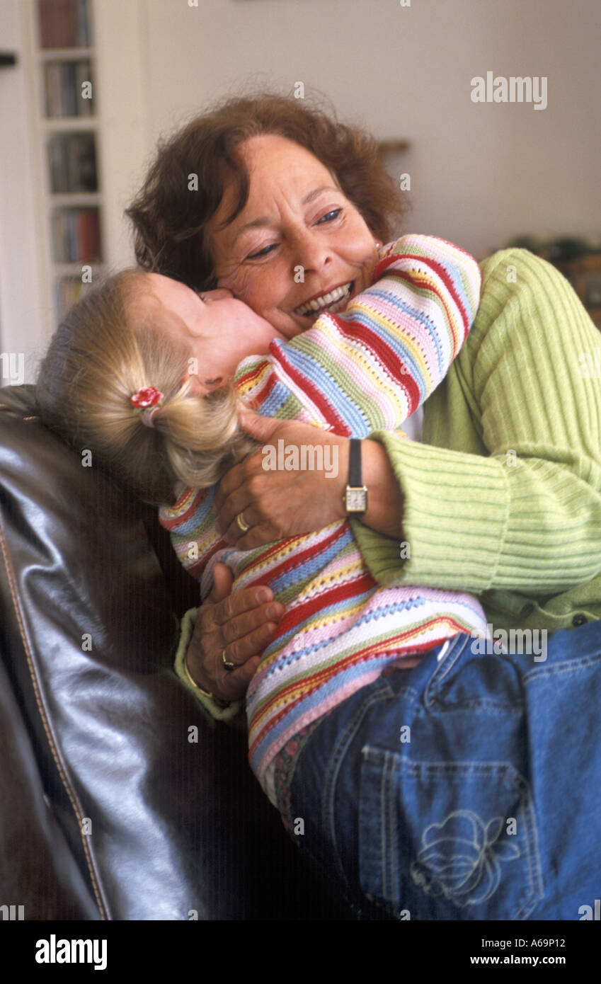 grandmother hugging with grandchild Stock Photo - Alamy