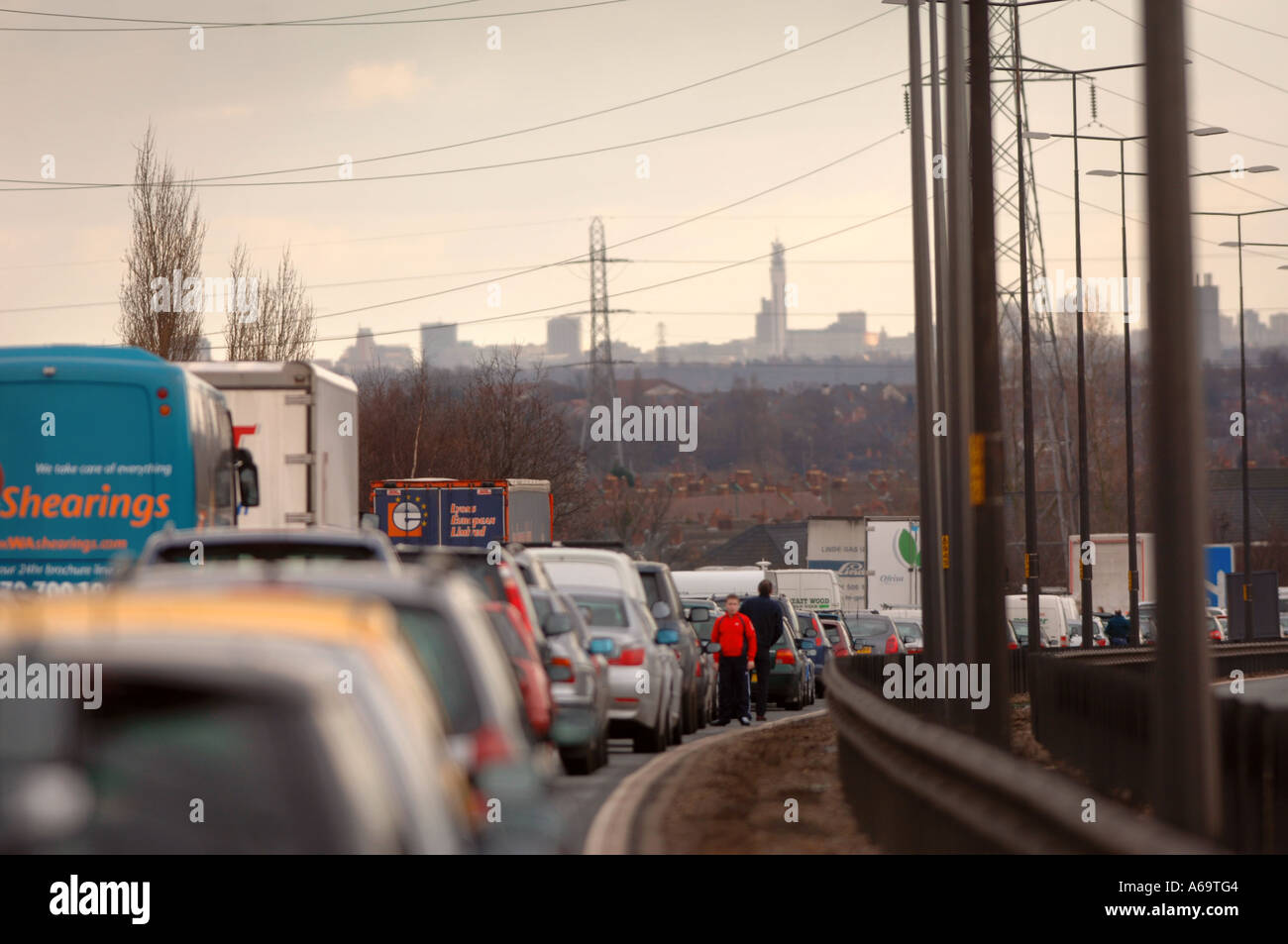 MOTORISTS LEAVE THEIR CARS IN A TRAFFIC JAM FOLLOWING A POLICE INCIDENT ...
