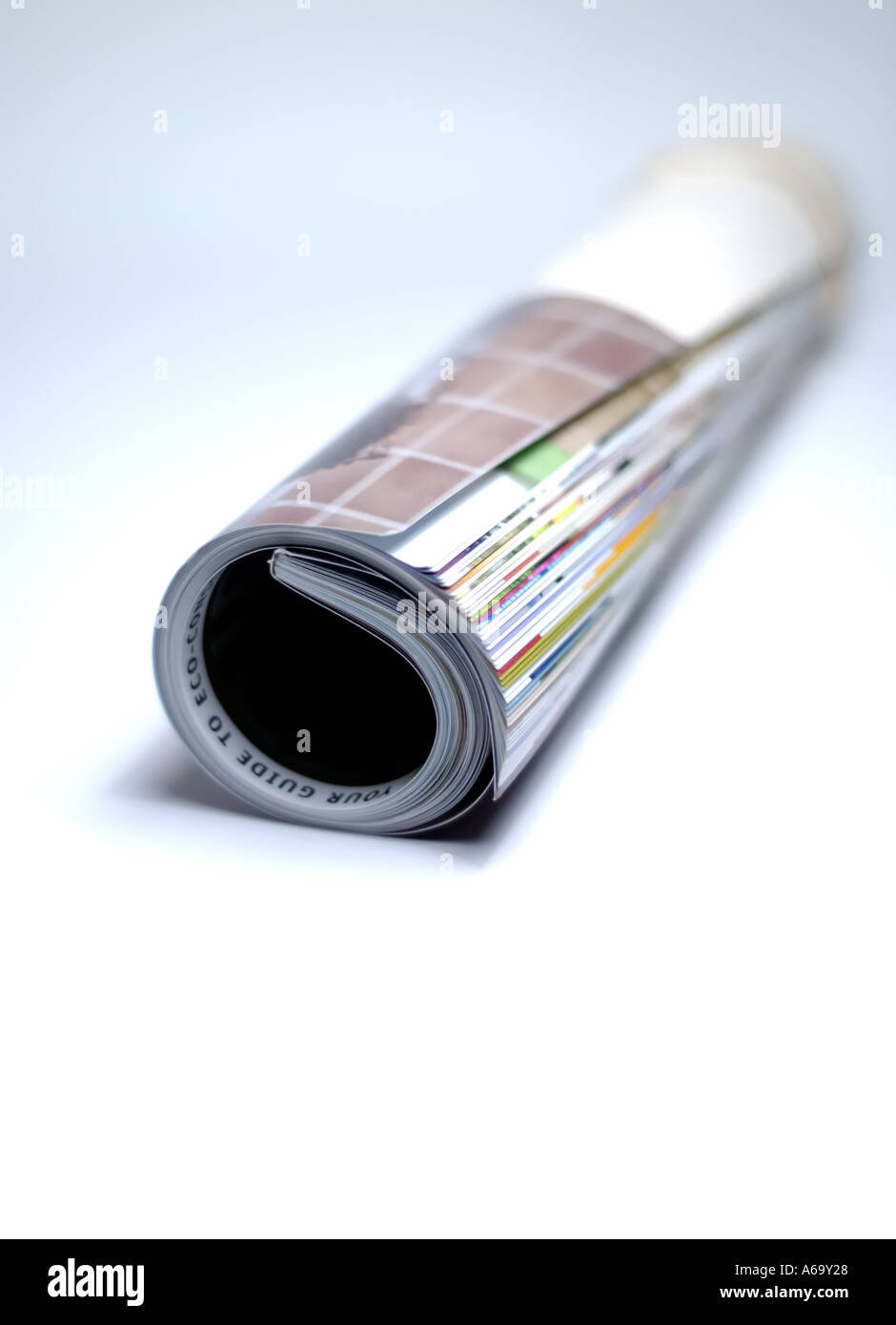 Rolled up magazine Stock Photo - Alamy