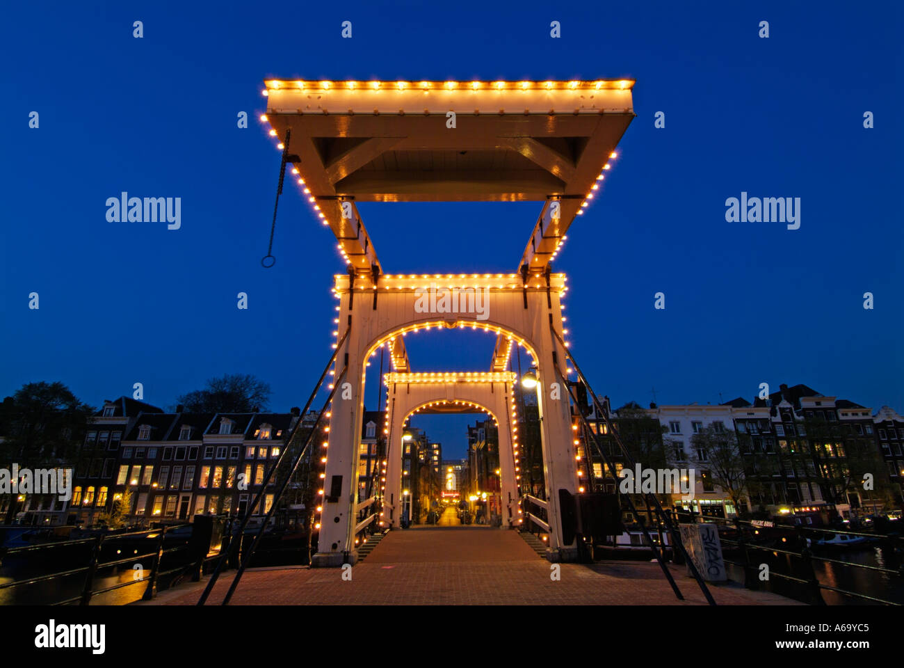 Magere brug or the Skinny bridge double drawbridge spanning the river ...