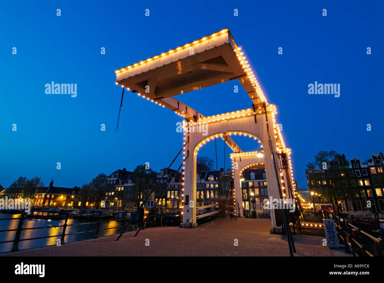 Magere brug or the Skinny bridge double drawbridge spanning the river ...