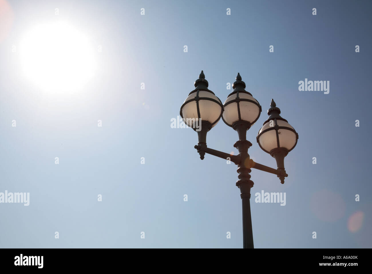 sun beating down over lamps at alexandra palace Stock Photo - Alamy