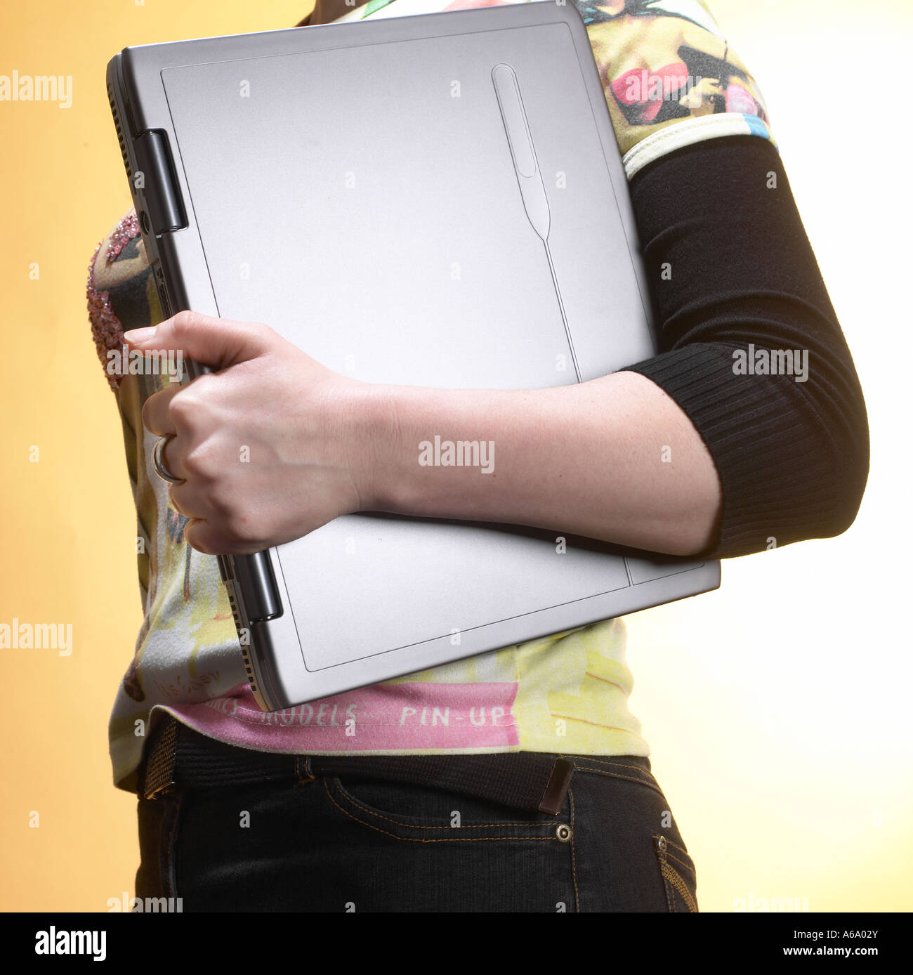 woman carrying laptop Stock Photo - Alamy