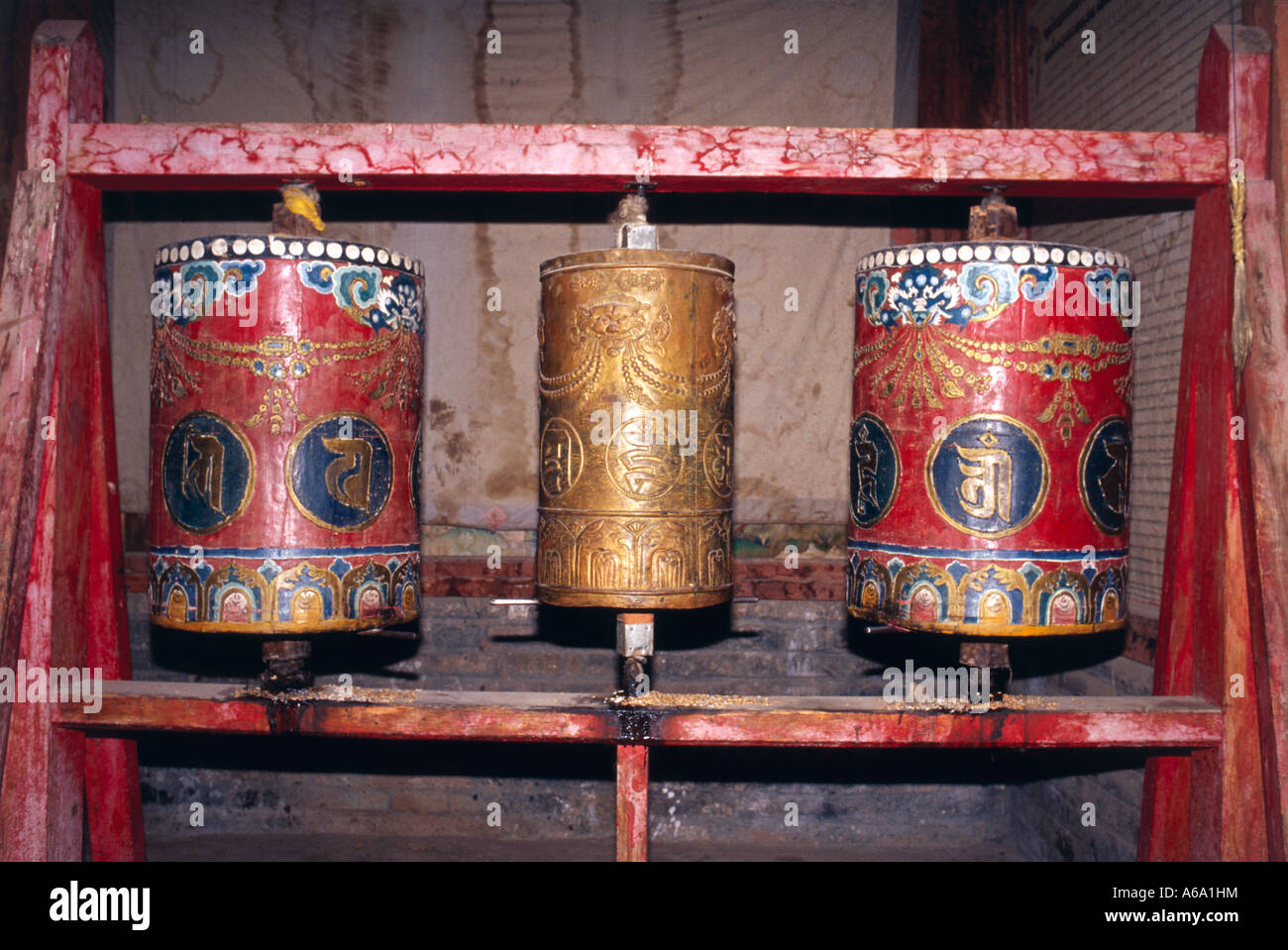 China, Qinghai, Ta'er Si, prayer wheels, sacred mantras inserted into ...
