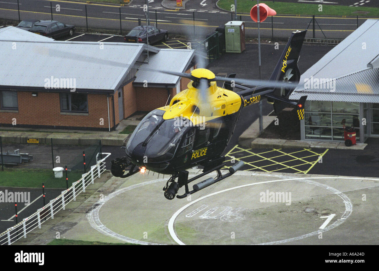 Police Helicopter lifts from heliport Glasgow Scotland Jan 2002 Stock ...