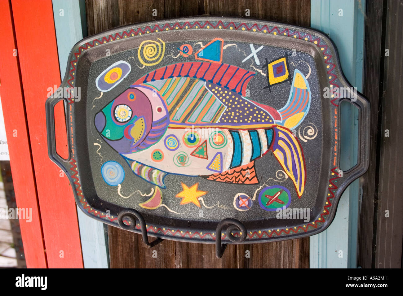 Artist painted colorful fish design on a tray displayed in the Arthouse ...