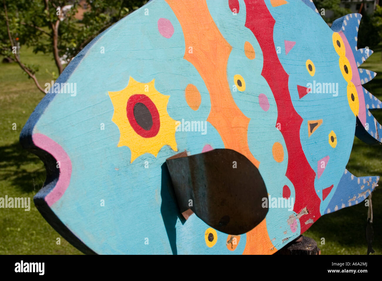 Colorful painted fish outside the Arthouse Gallery. "Otter Tail ...