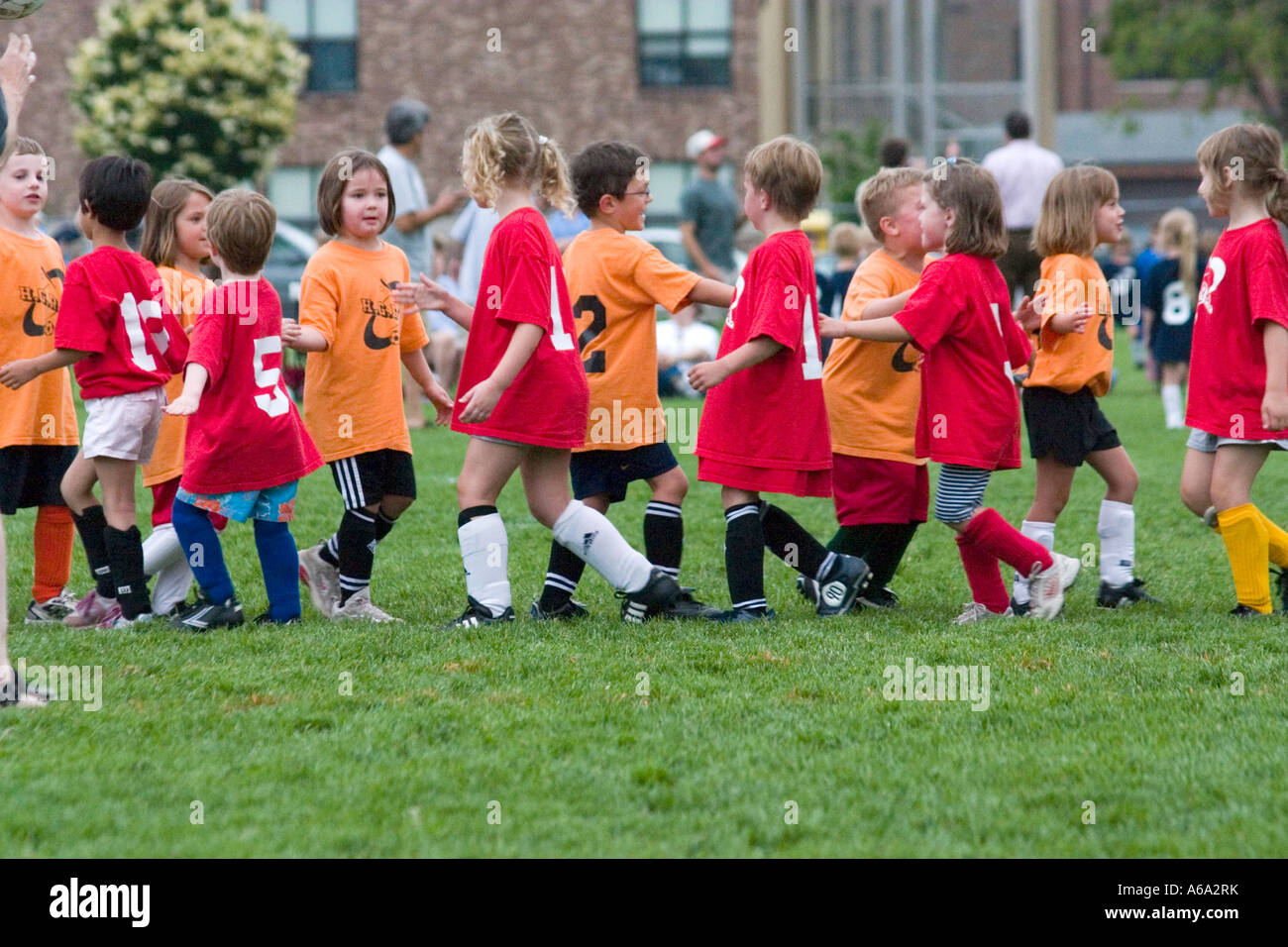 Kids male soccer players shaking hands hi-res stock photography and ...