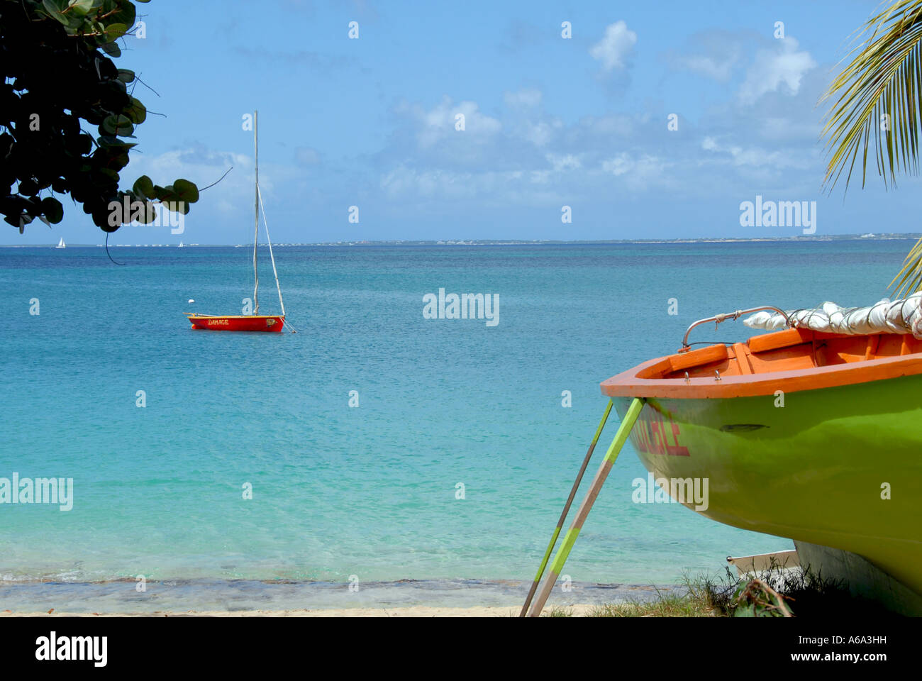 Beached rowboat facing the sea Stock Photo - Alamy