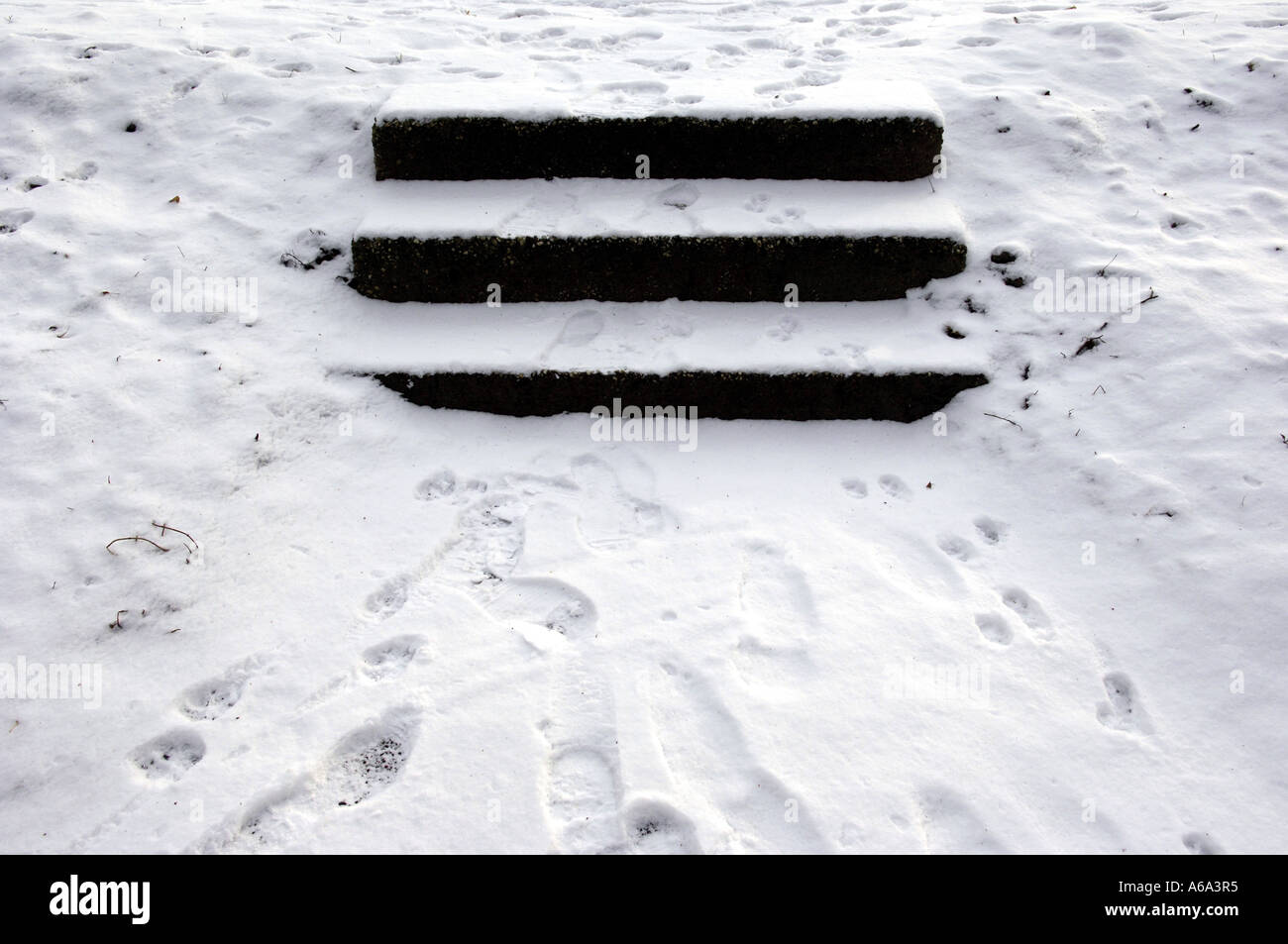 snow covered grid drain floor roadside road winter wintry ice cold ...