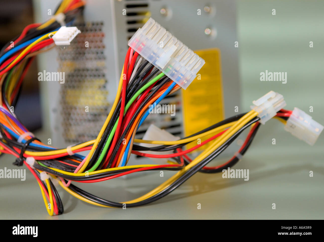a computer power supply with plugs and different coloured leads Stock ...