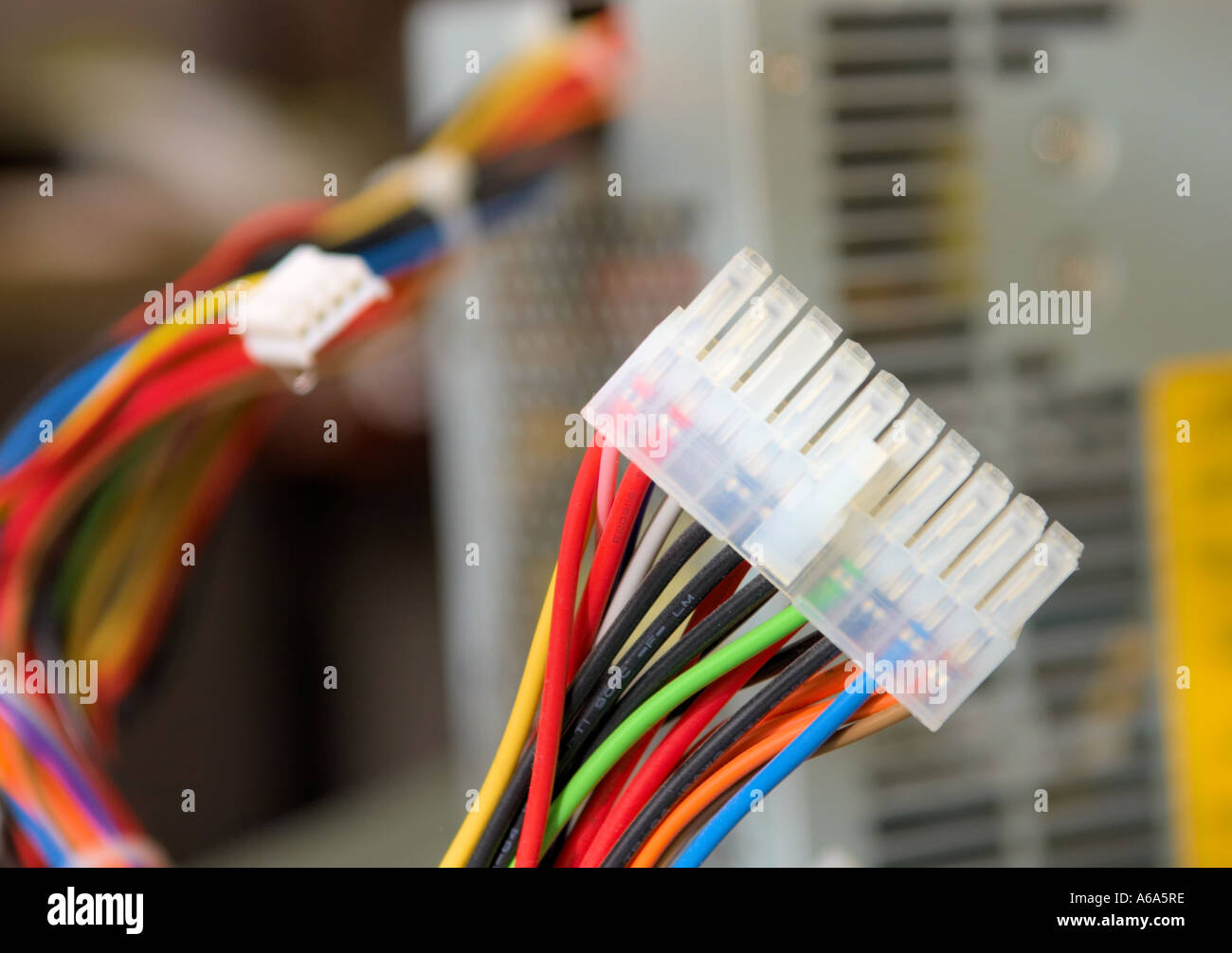a computer power supply with plugs and different coloured leads Stock ...