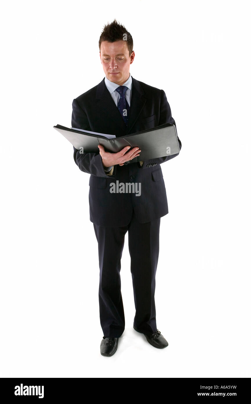 Businessman reading paperwork office Cut Out Stock Images & Pictures ...