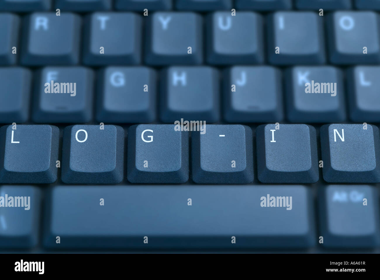LOG IN on a computer keyboard toned blue Stock Photo - Alamy LOG IN on a computer keyboard toned blue Stock Photo - Alamy