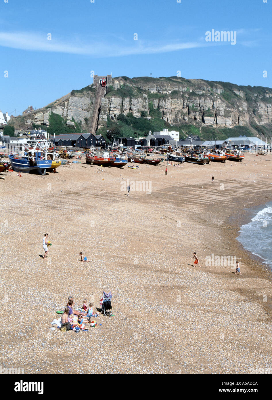 Hastings seaside holiday resort people on Stade beach fishing boats ...