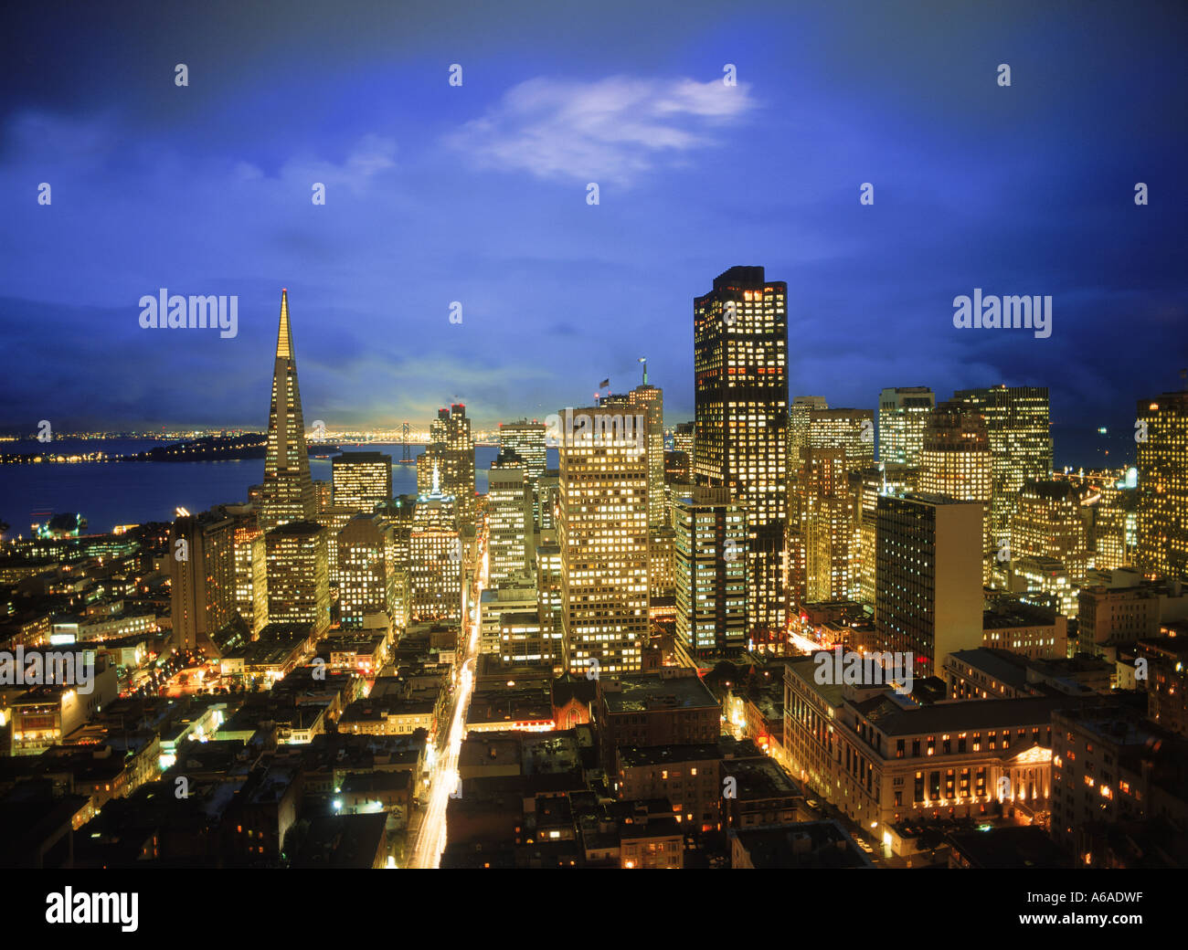 Transamerica Pyramid and Oakland Bay Bridge with San Francisco skyline ...