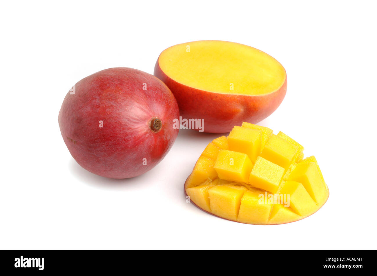 Fresh Mangos one cut and prepared ready to eat Stock Photo - Alamy