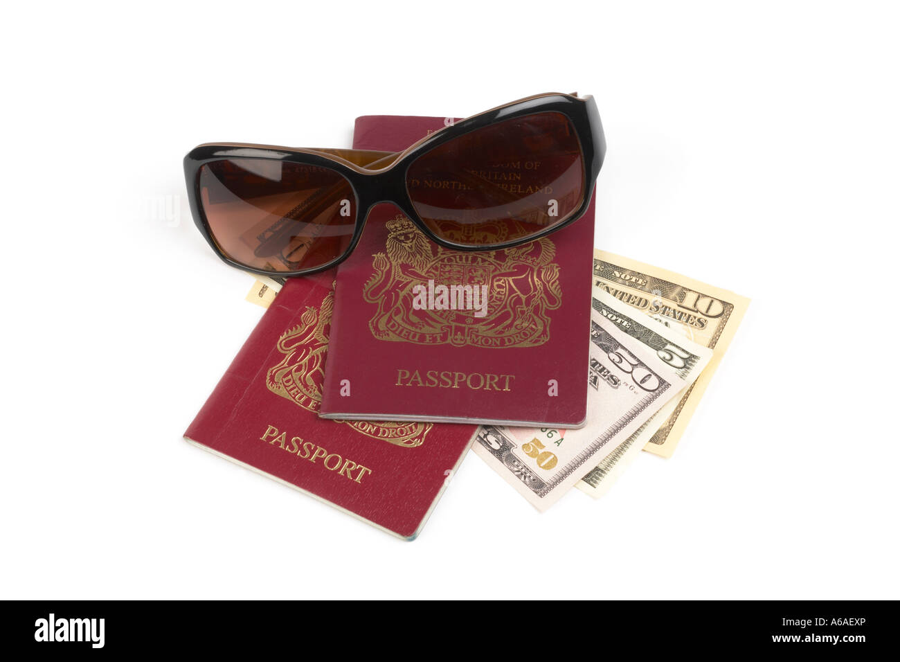 Travel money concept sunglasses Cut Out Stock Images & Pictures - Alamy