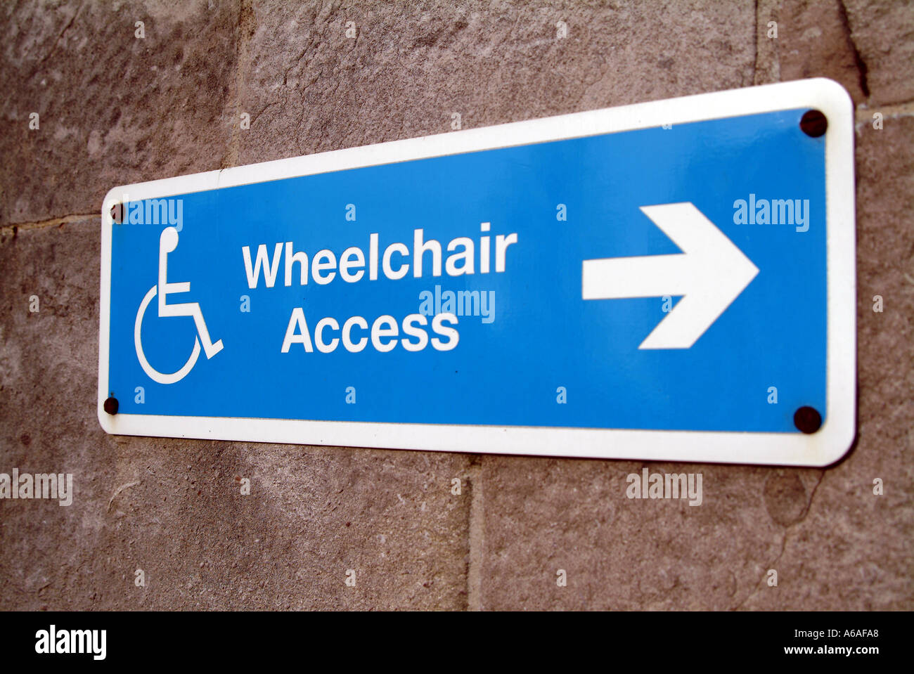 wheelchair access blue sign red sandstone wall cumbria sign blue ...