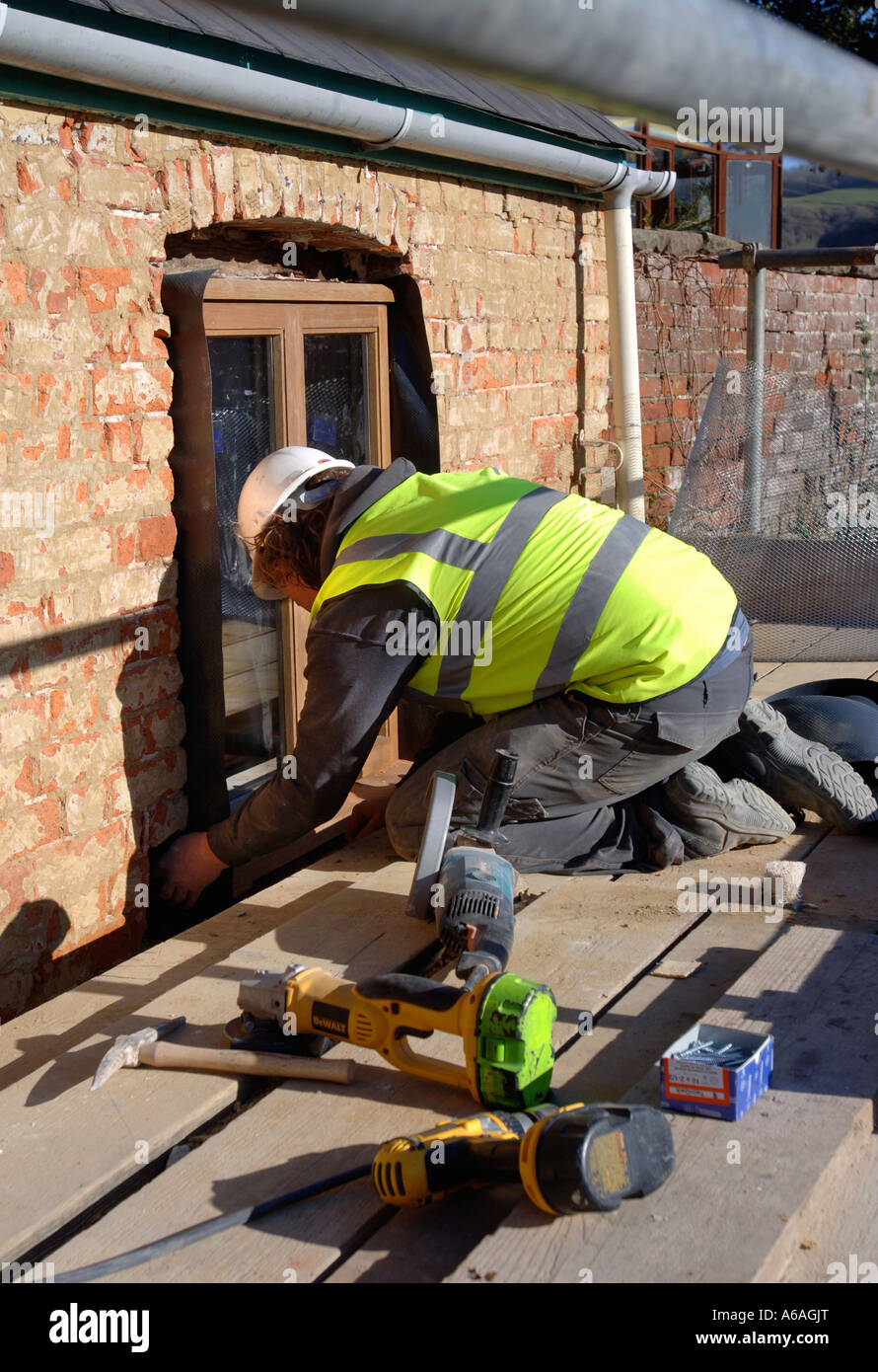 FITTING A PROTECTIVE DAMP PROOF PLASTIC MEMBRANE WHILE FIXING NEW ...