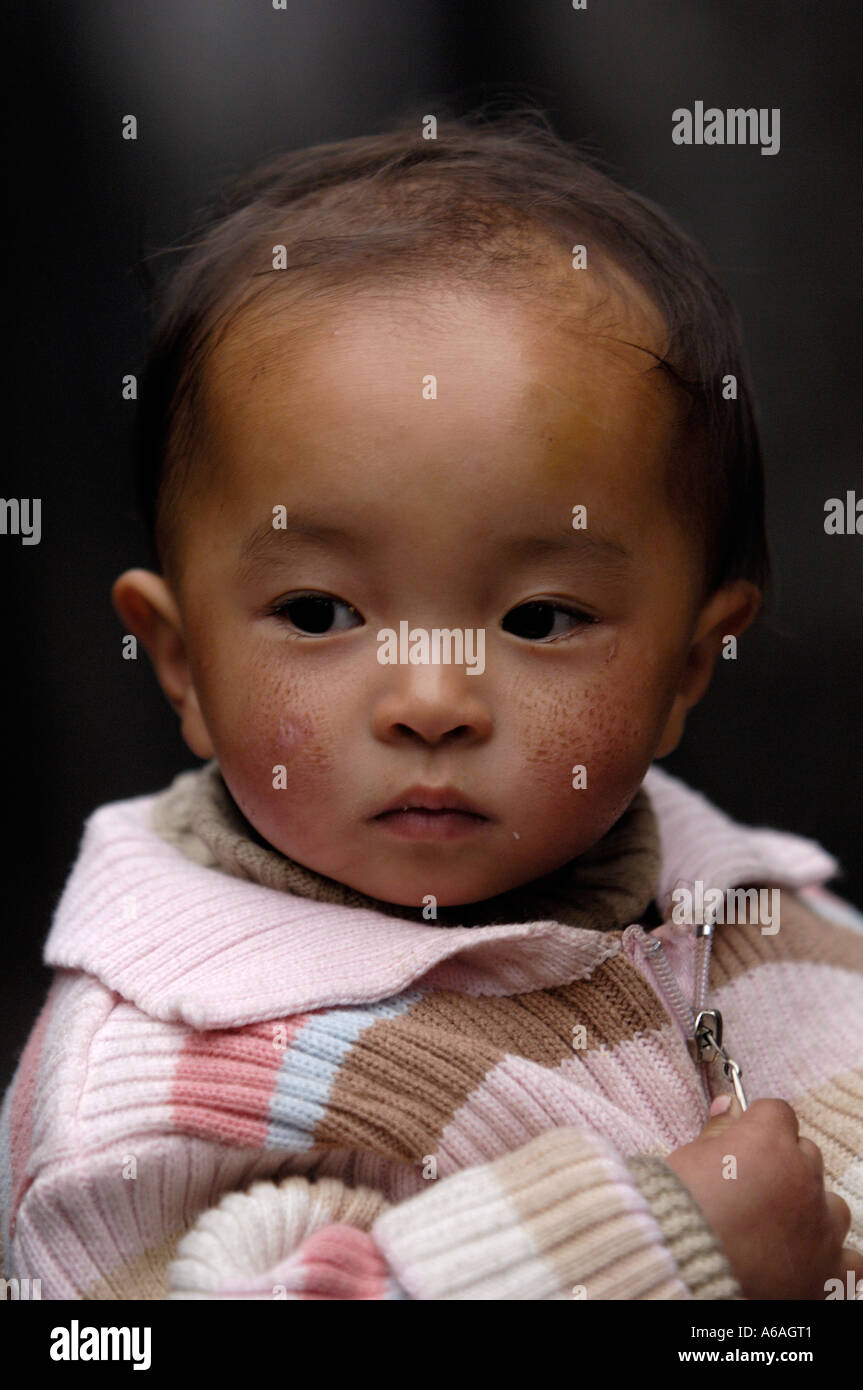 A little girl in LiuKeng village, LeAn county, Jiangxi province, China ...