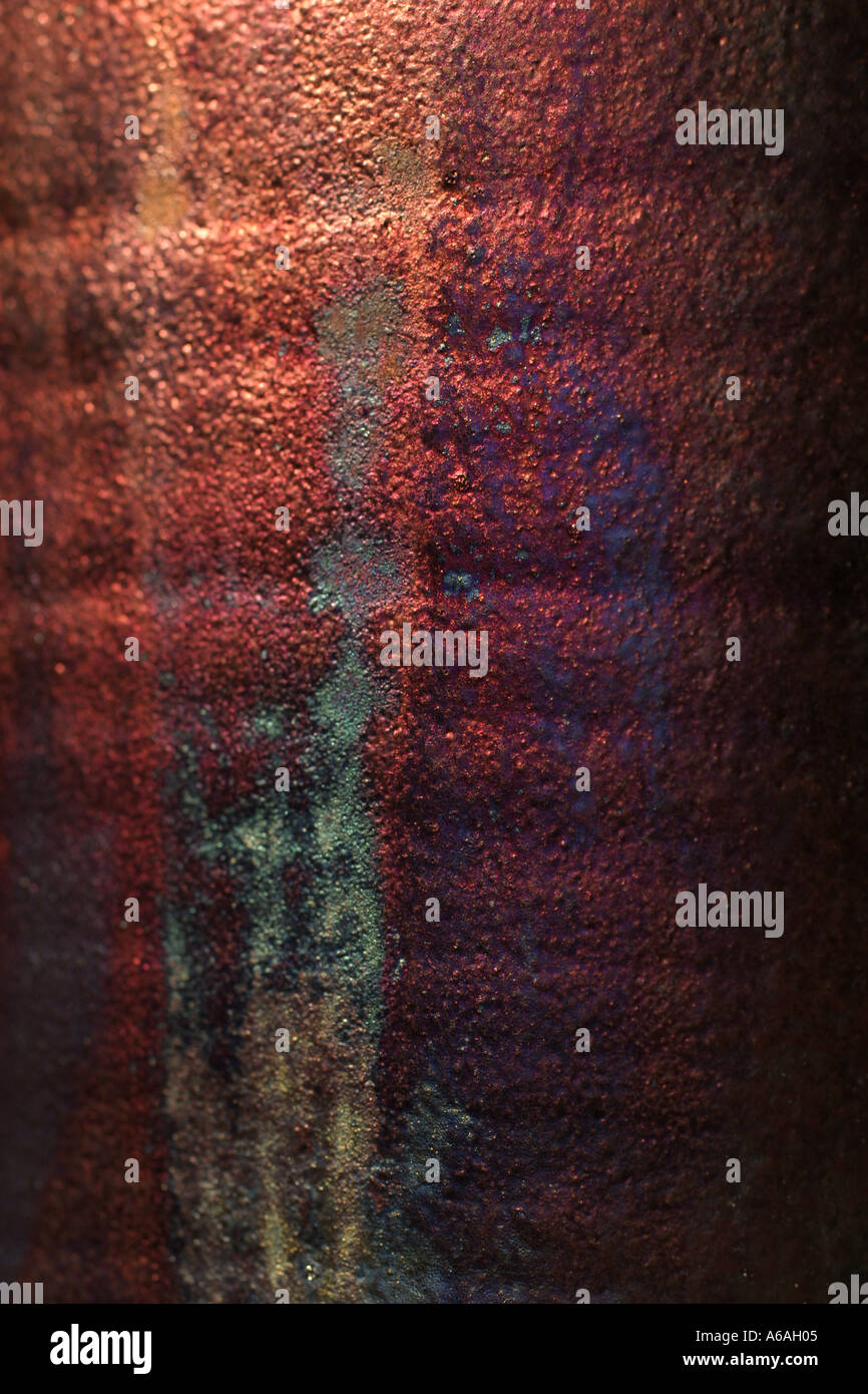 metallic rainbow color from detail of raku vase Stock Photo - Alamy
