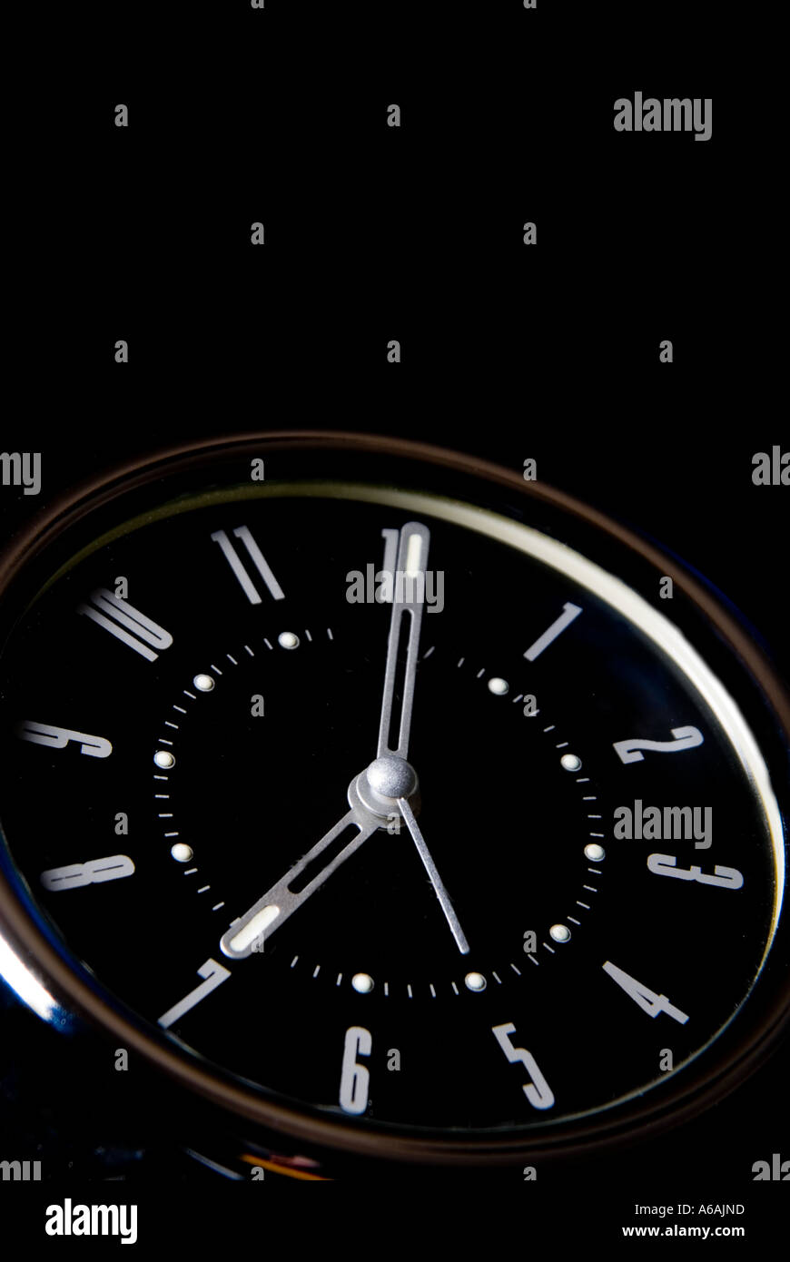 Alarm clock set at seven o clock Stock Photo - Alamy