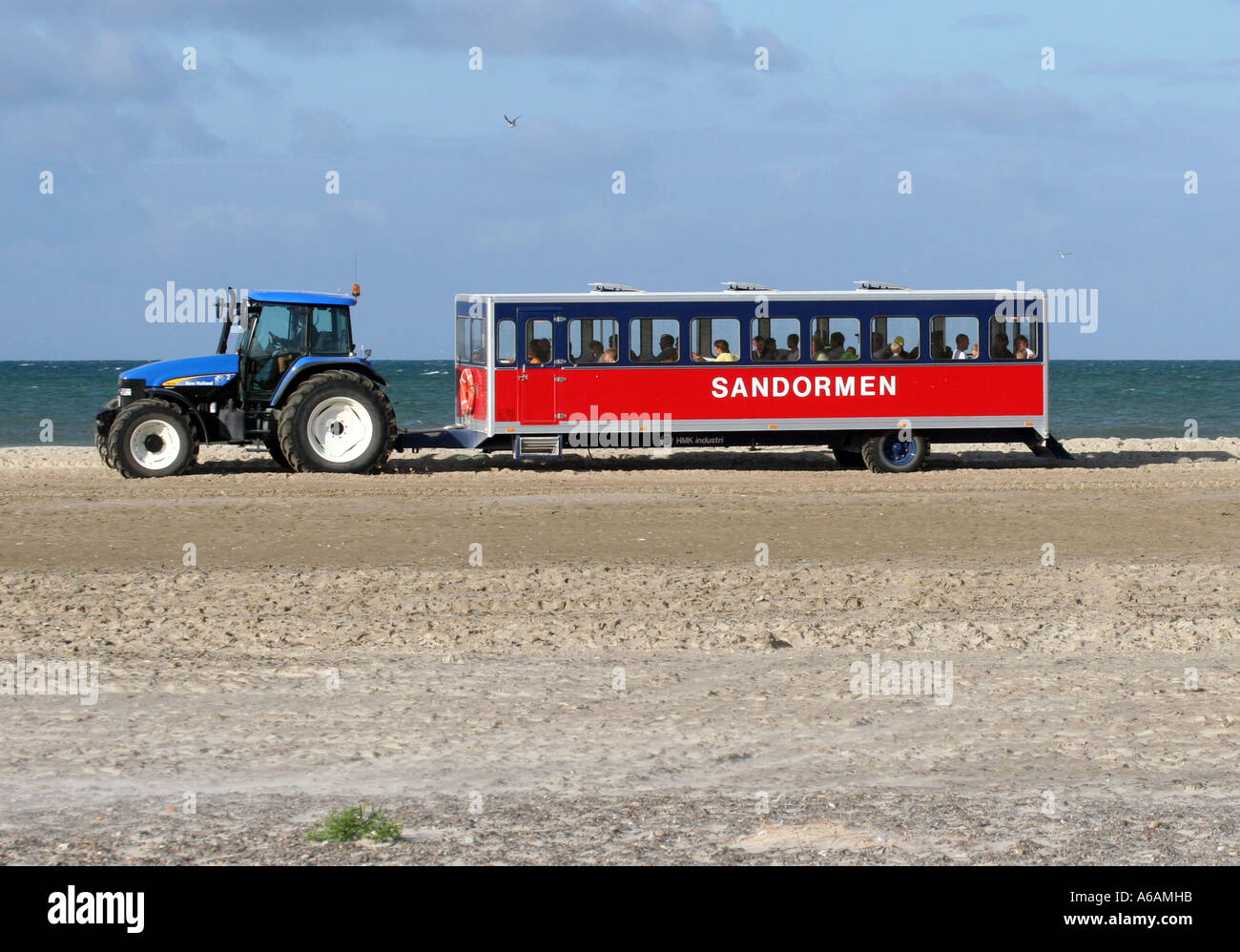 Tractor functioning as peoplecarrier Stock Photo - Alamy