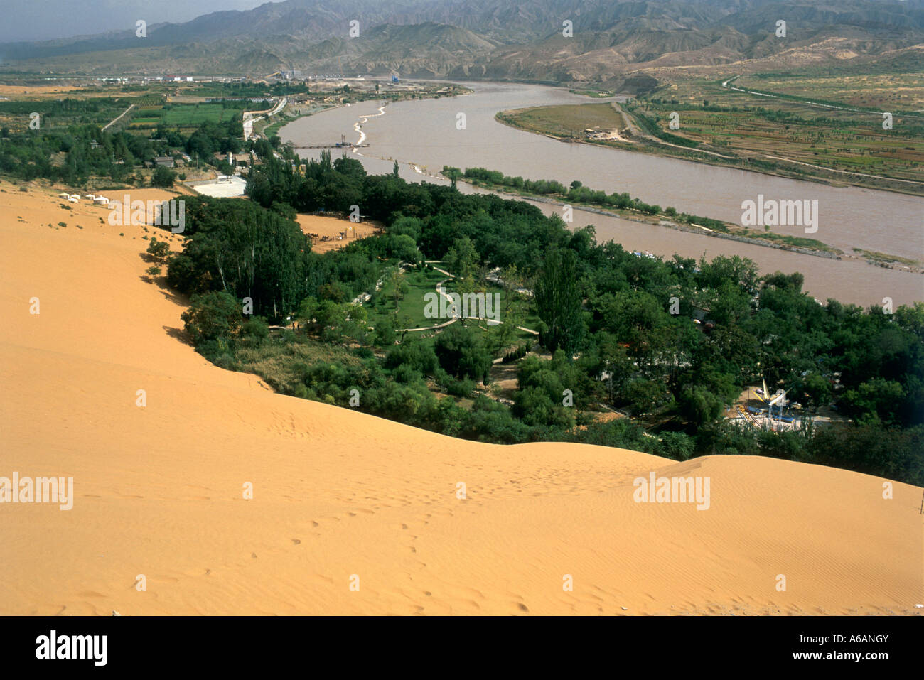 China, Ningxia, Shapotou, Yellow River, between riverbank vegetation on ...