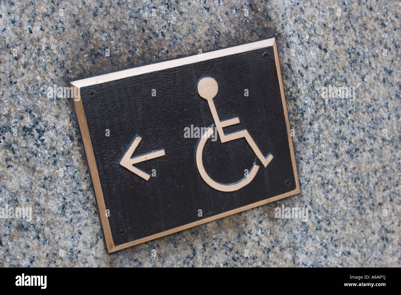 Disabled wheelchair sign and arrow pointing Stock Photo - Alamy