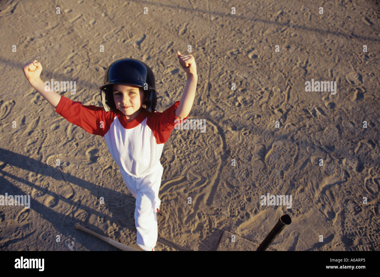 Young girl 7 celebrating after getting winning hit T ball smiling proud ...