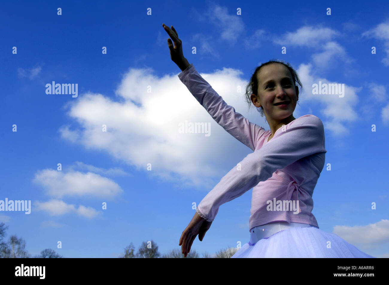 ballerina blue sky girl ballet dance Stock Photo - Alamy
