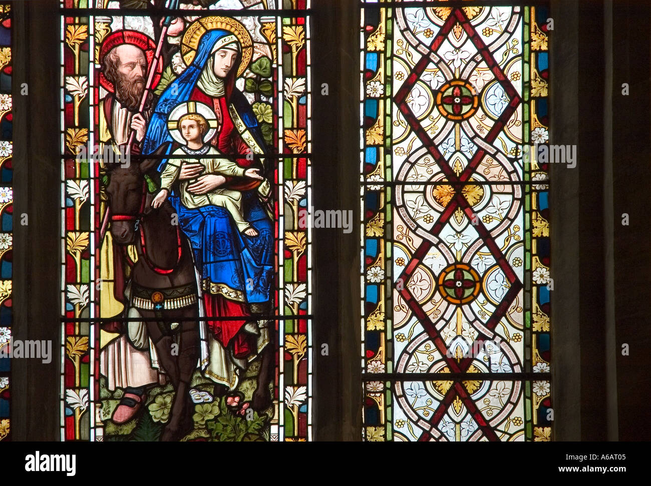 Holy family in a stained glass window Stock Photo - Alamy