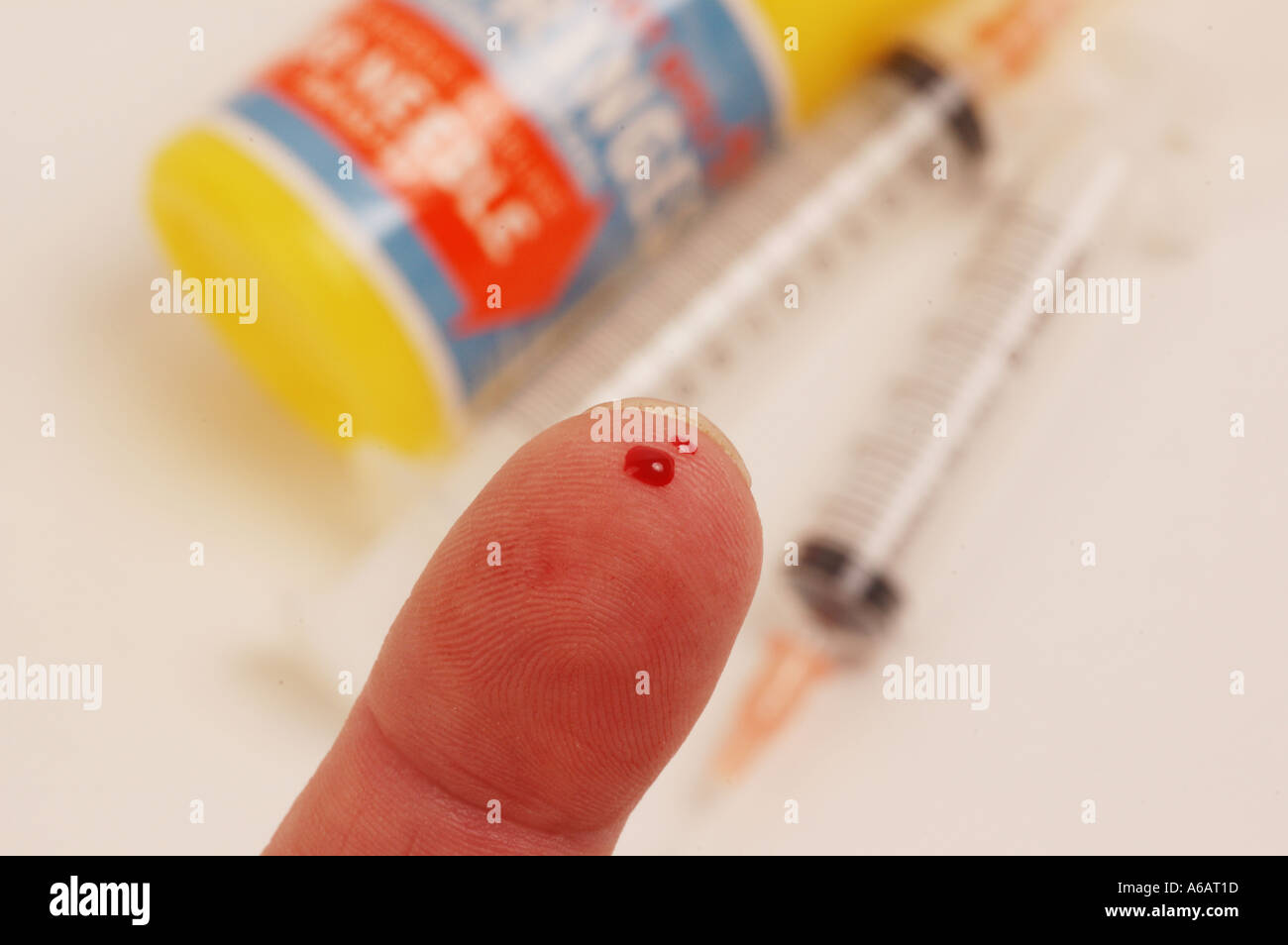 Finger stabbed by syringe dsca 0793 Stock Photo - Alamy